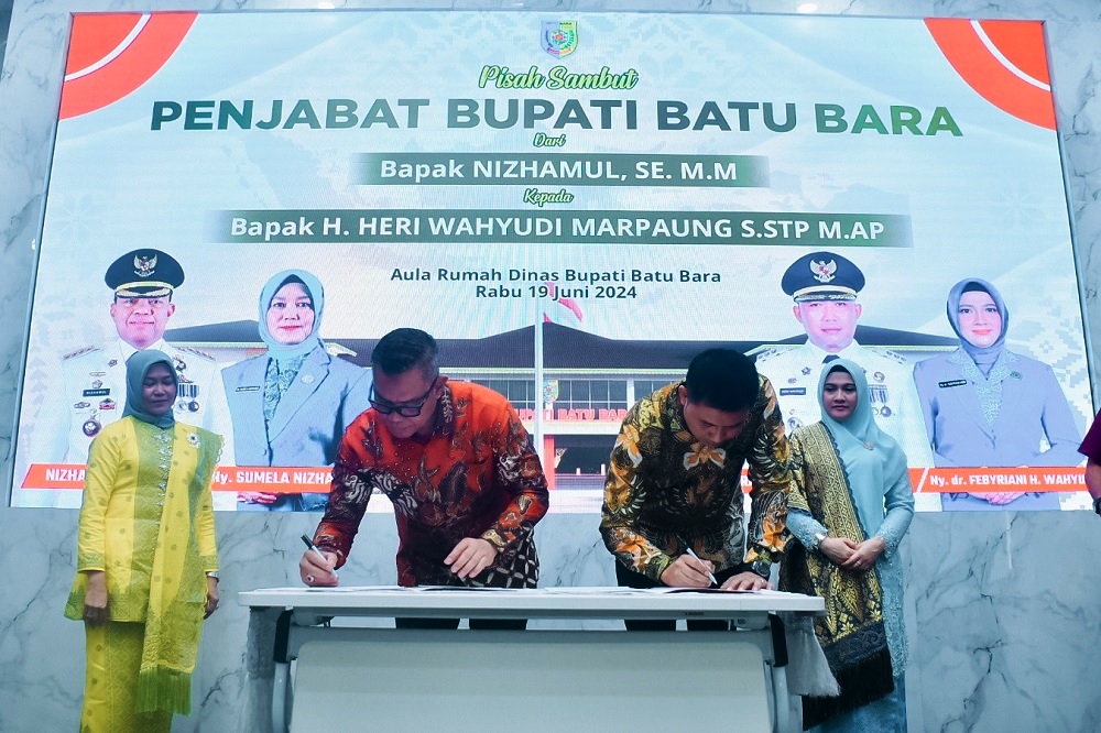 Pisah Sambut Pj Bupati Batubara Nizhamul Kepada Heri